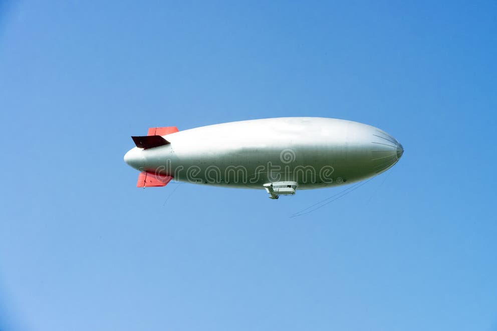 Zeppelin, Airship Flying in Blue Sky Stock Photo - Image of dirigible ...
