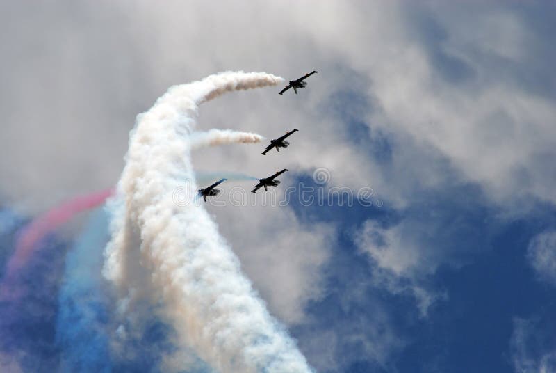 Airshow Planes Group with Smoke Against the Blue Sky Stock Photo ...