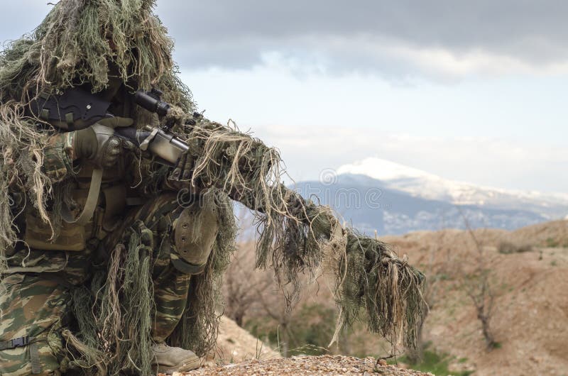 Airsoft Sniper on Hill Rocks Stock Photo - Image of combat, target ...