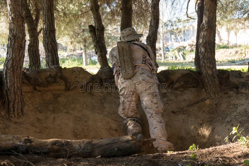 Airsoft soldier waiting stock photo. Image of game, rifle - 50229614