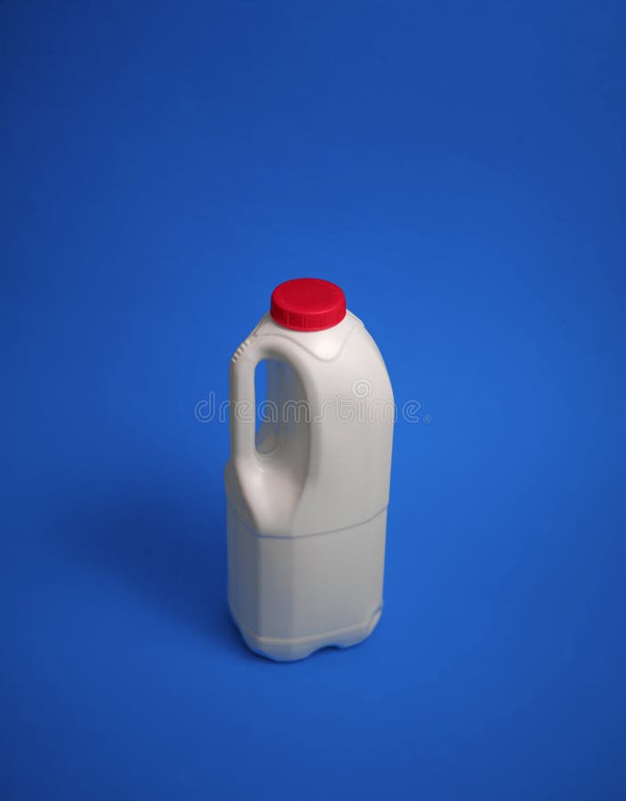 Airtight One Gallon Milk Jug With A Blue Cap On Stock Photo - Image of ...