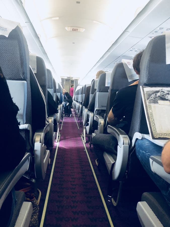 Aisle on airplane editorial stock image. Image of plane - 140039069