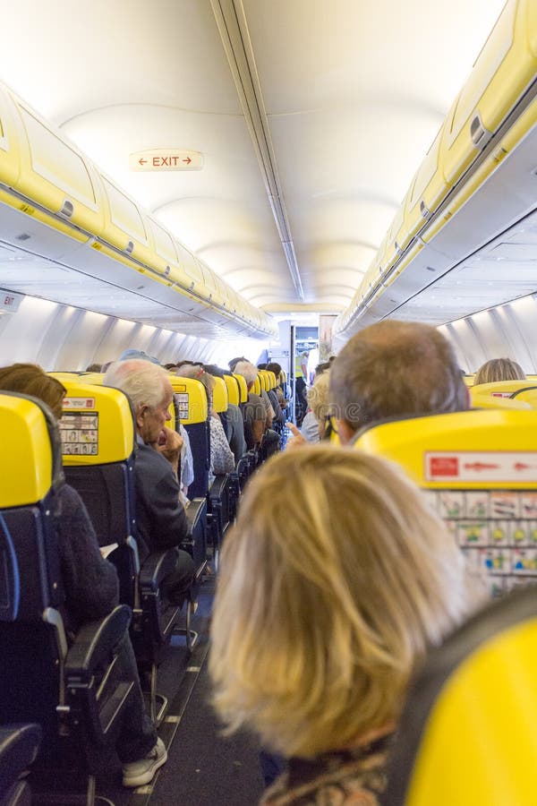 Aisle in an airplane editorial stock photo. Image of onboard - 80471423