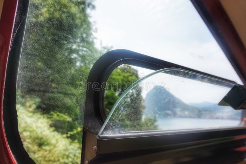 Ajar Window of a Traveling Funicular. Stock Image - Image of mirror ...