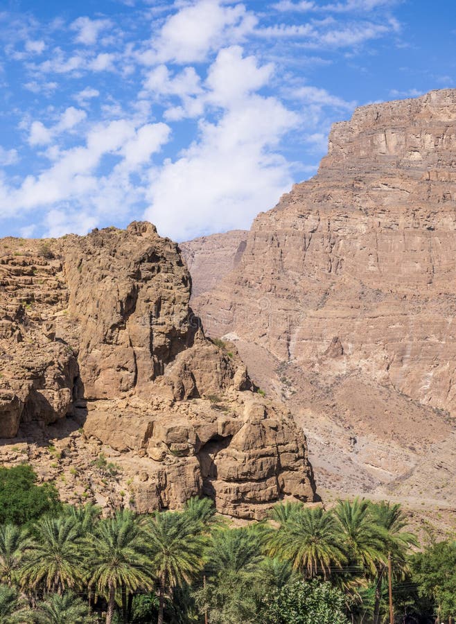 Al Hajar Mountains in Oman stock photo. Image of clouds - 65265570