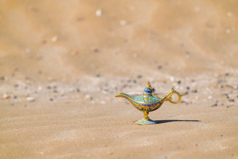 Aladdin Lamp on the Sand in the Desert, Good Luck Symbol Stock Image ...