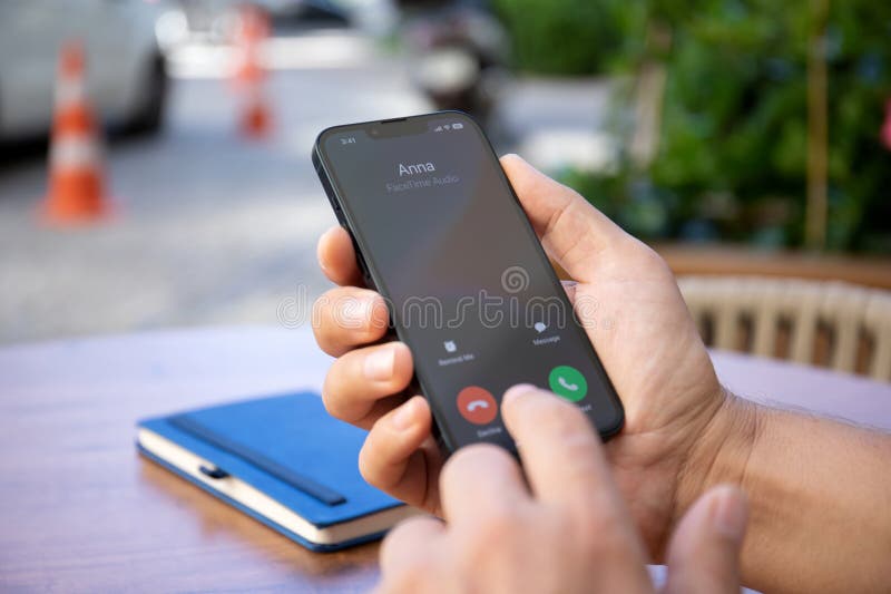 Man Hand Holding IPhone 14 Graphite with Call Number Screen Editorial ...