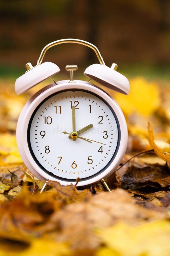 Alarm Clock with Autumn Foliage, End of Daylight Saving Time in Fall ...