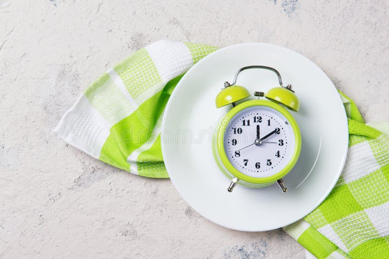 Alarm Clock with Bells on the Plate, Lunch Time Concept, Top View with ...