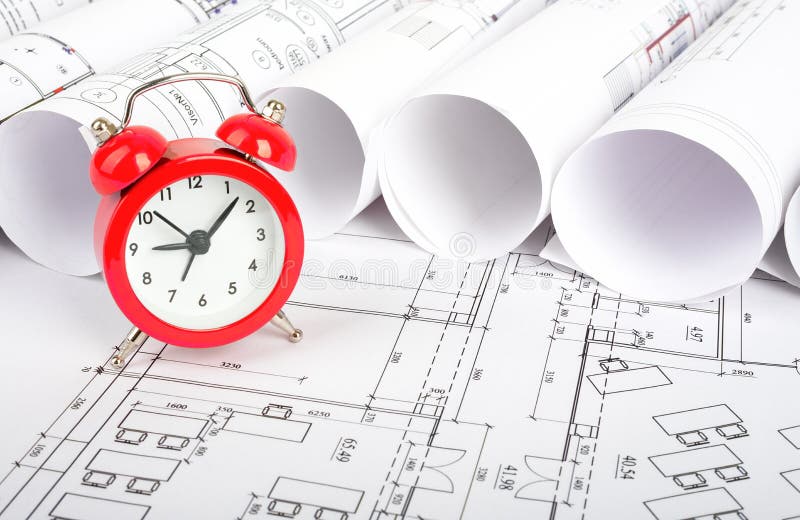 Alarm clock on blueprints stock photo. Image of clock - 65896718