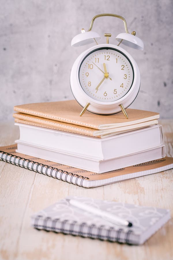 Alarm Clock and Books - Time Management and Procrastination Concept ...