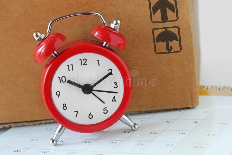 Alarm Clock and Card Box on Calendar - Delivery Time Concept Stock ...