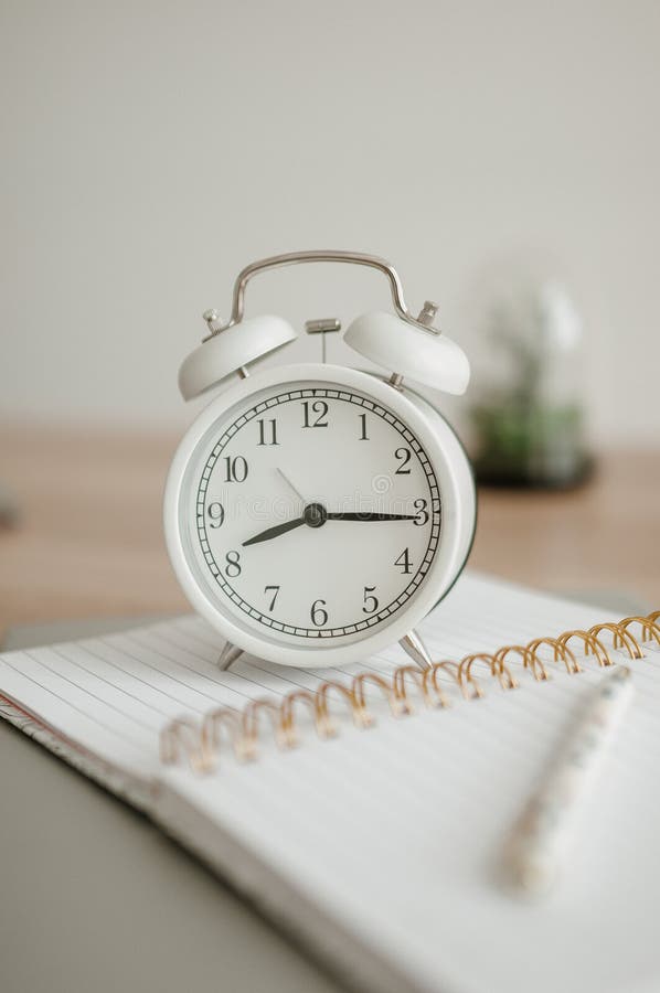 Alarm Clock on Desktop, Laptop and Notebook for Work Stock Photo ...