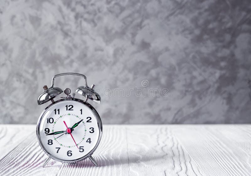 Alarm Clock at Empty Locker on White Background Stock Photo - Image of ...