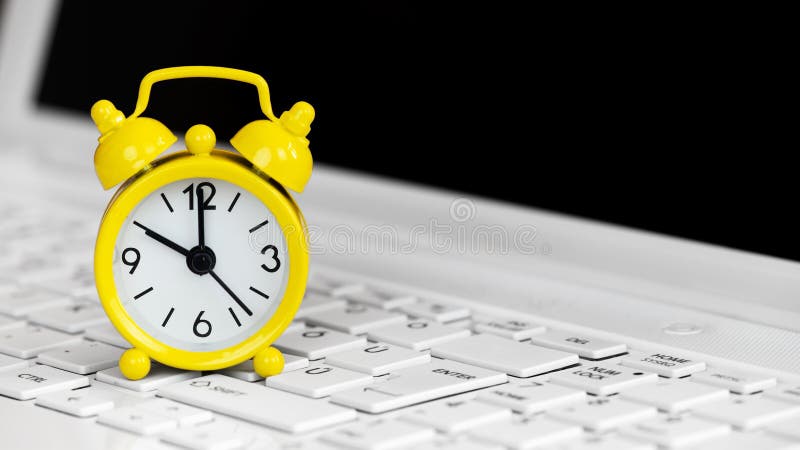 Alarm Clock on a Laptop Keyboard, Deadline Concept Stock Image - Image ...
