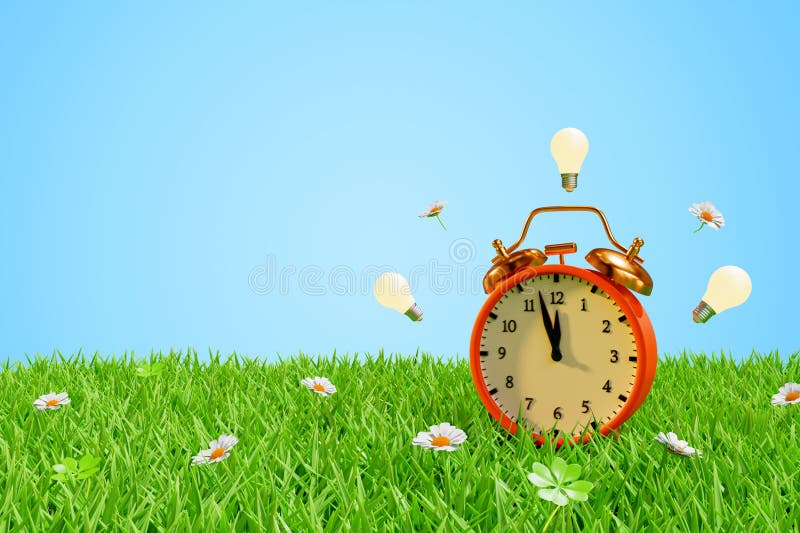 Alarm Clock in a Meadow in the Grass Surrounded by Light Bulbs ...