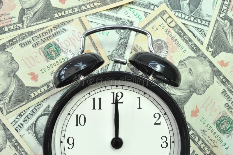 Alarm clock and money stock image. Image of banknotes - 20578471