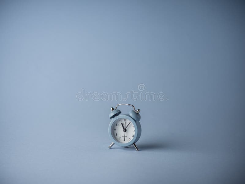 Alarm Clock Over a Solid Colour Background Stock Image - Image of ...