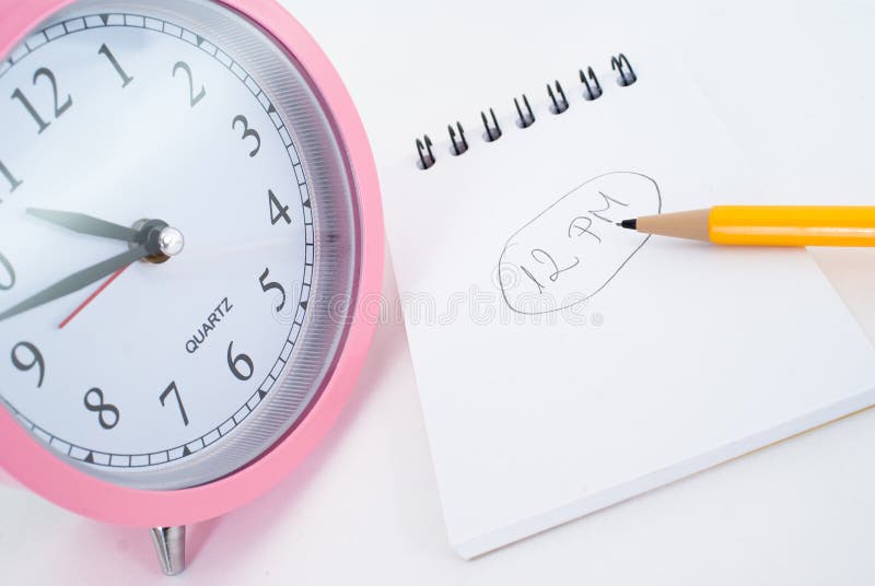 Alarm clock with paper stock image. Image of note, clock - 22990379