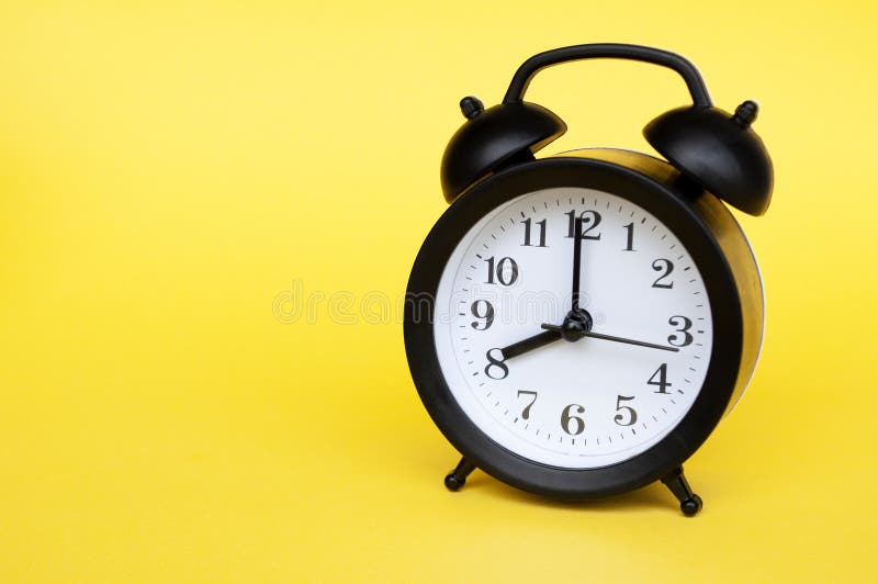 An Alarm Clock at 8am stock image. Image of black, clock - 6393985