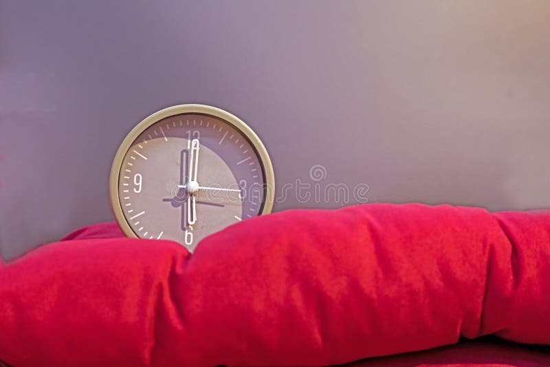 Alarm Clock on a Red Blanket Early in the Morning, so As Not To ...