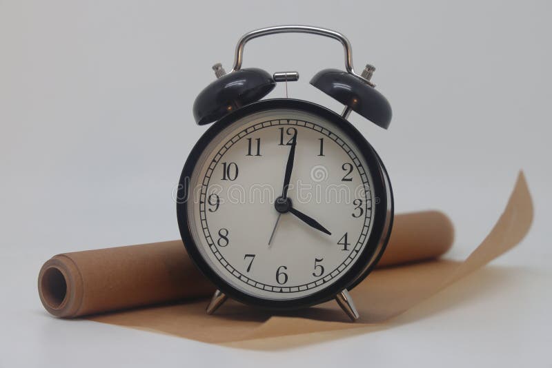 Alarm Clock and Rolled Paper on White Background. Time Management ...