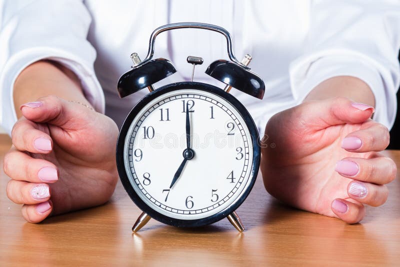 Alarm Clock at Seven O Clock Stock Image - Image of black, timepiece ...