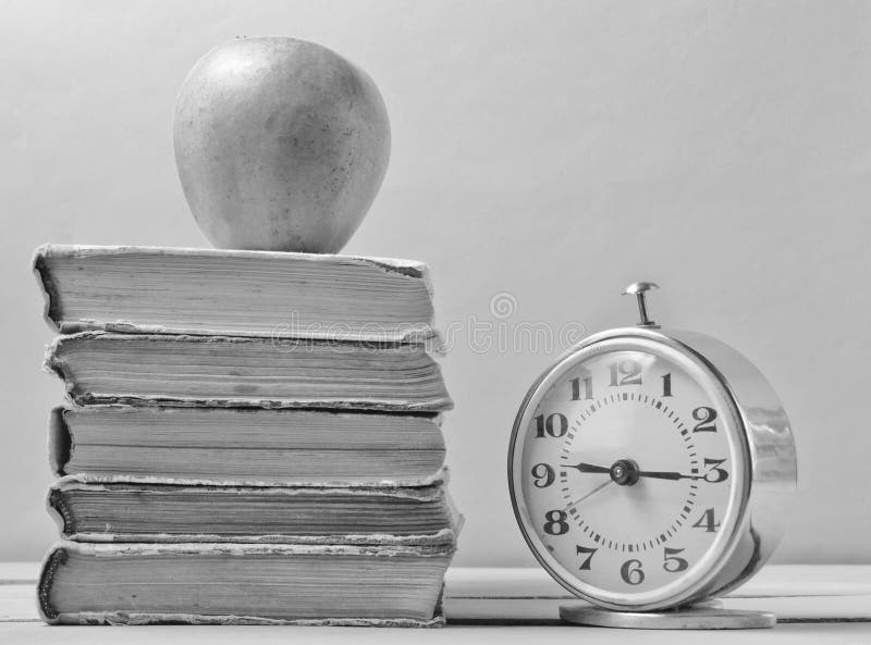 Alarm Clock, Stack Old Books, Apple on a Blue Background. School ...