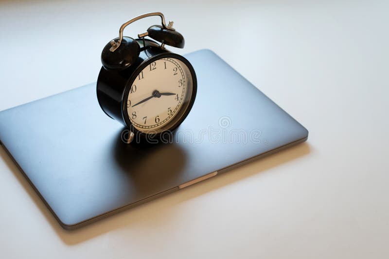 Concept of Work Deadline with Alarm Clock and Laptop Stock Photo ...