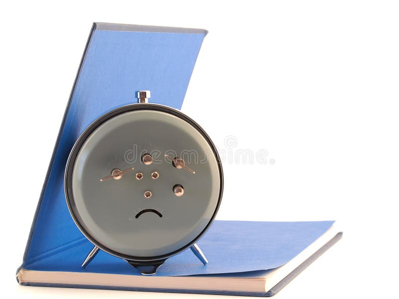 The Alarm Clock Standing on the Open Book Stock Image - Image of white ...