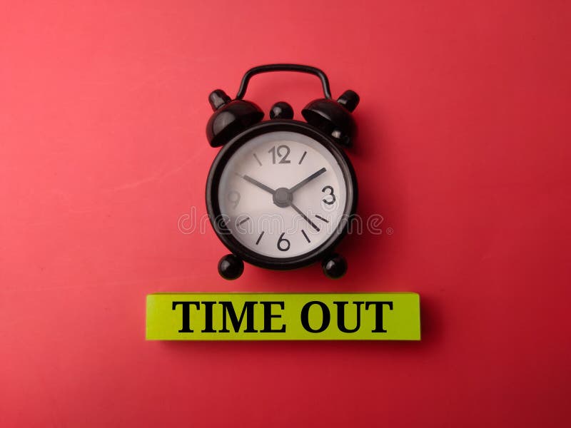 Alarm Clock and Sticky Note with the Word TIME OUT on a Red Background ...