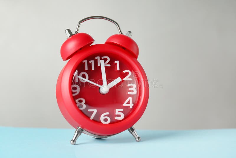 Alarm Clock on Table. Time Change Stock Photo - Image of adjust ... Alarm Clock on Table. Time Change Stock Photo - Image of adjust ...