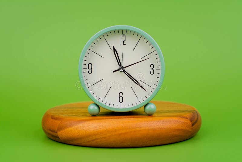 Clock Tells the Time of Work and daily Life. Green Clock Photo in ...