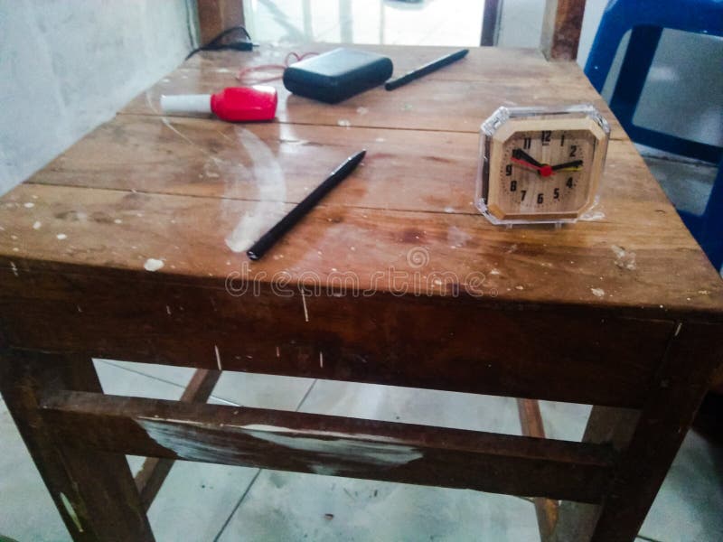 Alarm clock on wood chair stock image. Image of powerbank - 239764655