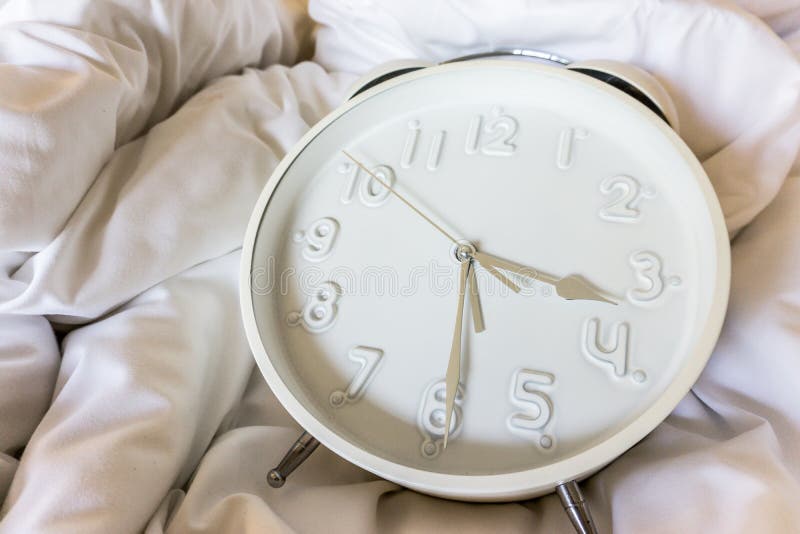 Alarm Clock on Wrinkle Messy Blanket. Stock Image - Image of household ...