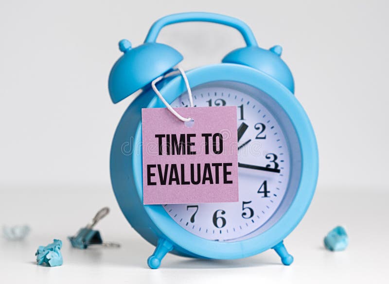 The Alarm Clocks Have a Sticker with the Inscription - Time To Evaluate ...