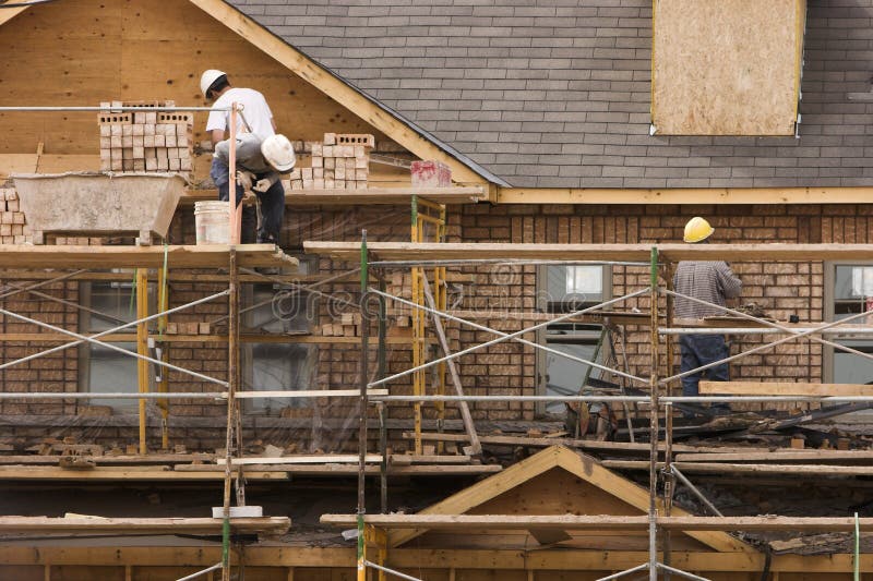 Albañiles foto de archivo. Imagen de concreto, casa, madera - 5243254