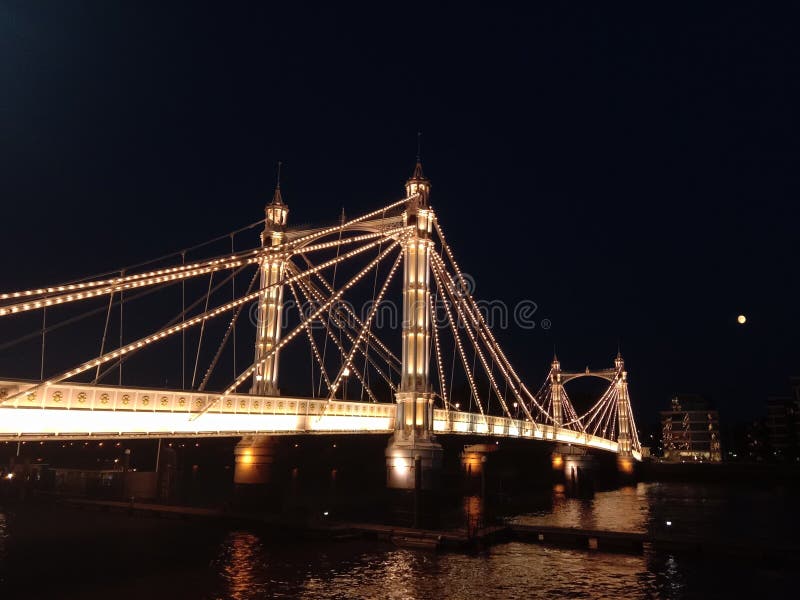 Albert Bridge Lit Up at Night Over the River Thames in London Editorial ...