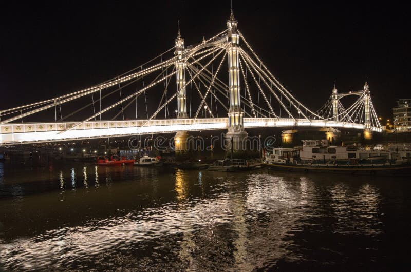 Albert Bridge in London at Night Stock Photo - Image of boat, river ...