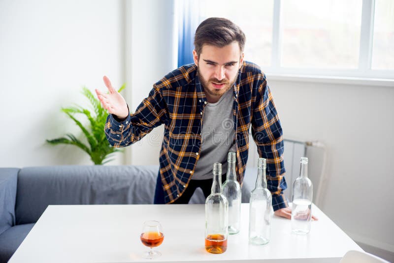 Alcohol addicted man stock image. Image of problem, addicted - 99820337