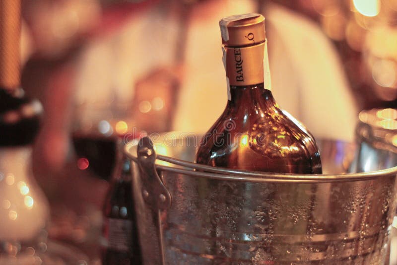 Alcohol Bottle in Ice Bucket Stock Image - Image of droplet, bier ...