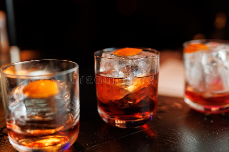 Alcohol Cocktail Drink on the Table, Whiskey and Rum Coctail on the Bar ...