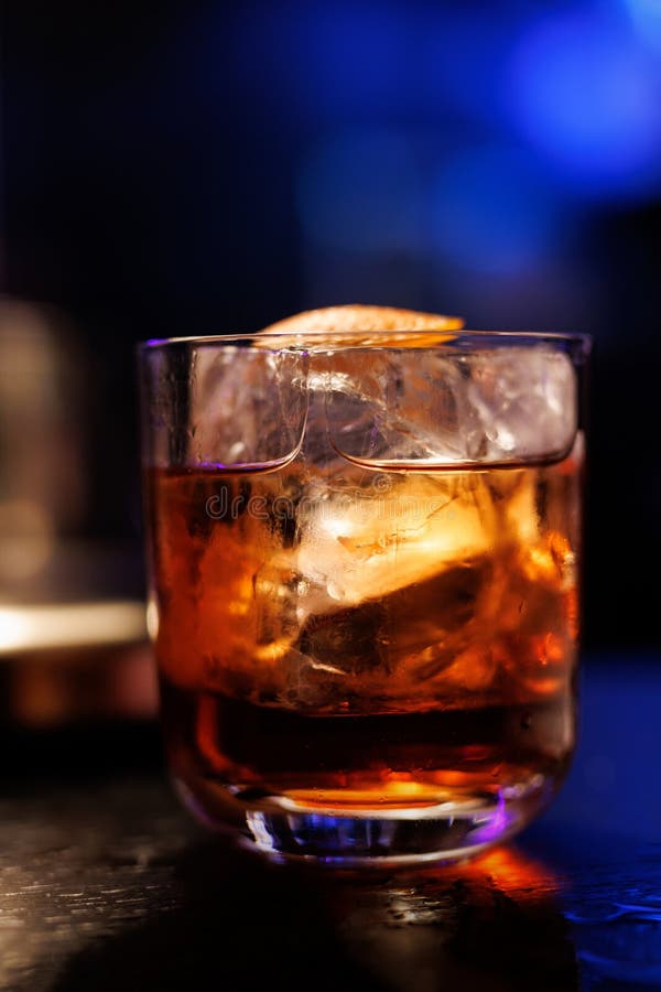 Alcohol Cocktail Drink on the Table, Whiskey and Rum Coctail on the Bar ...