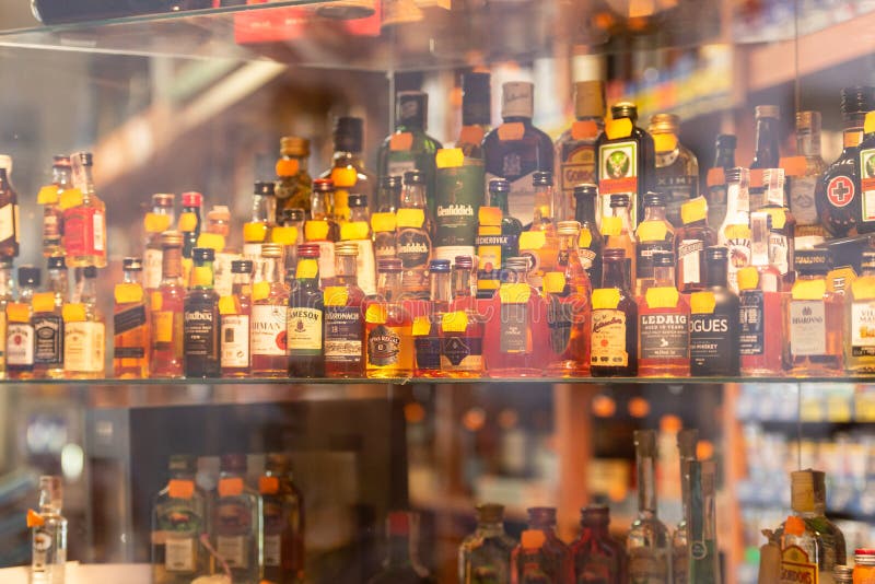 Alcohol display case editorial image. Image of bottle - 208594585
