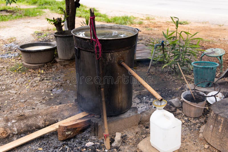 Alcohol Distillation Process in Laos Stock Photo - Image of making ...