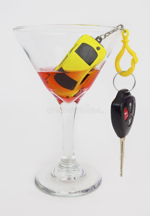 Alcohol while Driving a Car. a Driver Who Drinks Alcohol at the Wheel ...