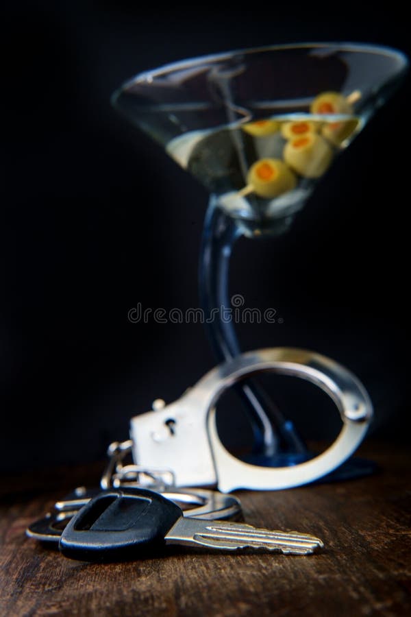 Cocktail and handcuffs stock photo. Image of studio, drink - 13245870