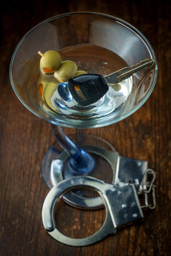 Cocktail and handcuffs stock photo. Image of studio, drink - 13245870