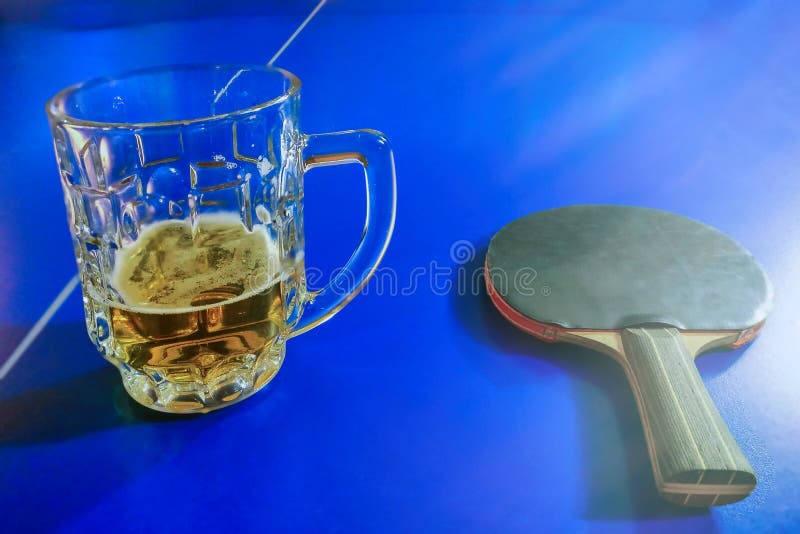 Alcohol and a Ping-pong Racket on the Table Stock Photo - Image of ...