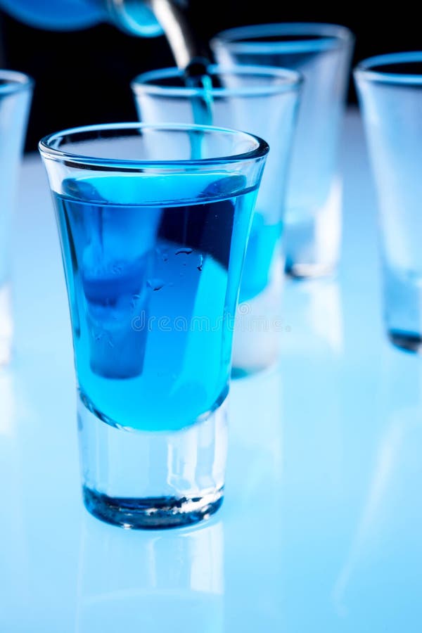 Alcohol in shot glasses stock photo. Image of strong - 51012498